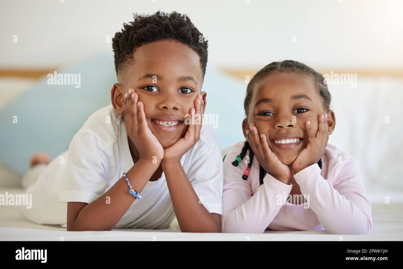 Happy child laying in bed dark hi-res stock photography and images - Alamy