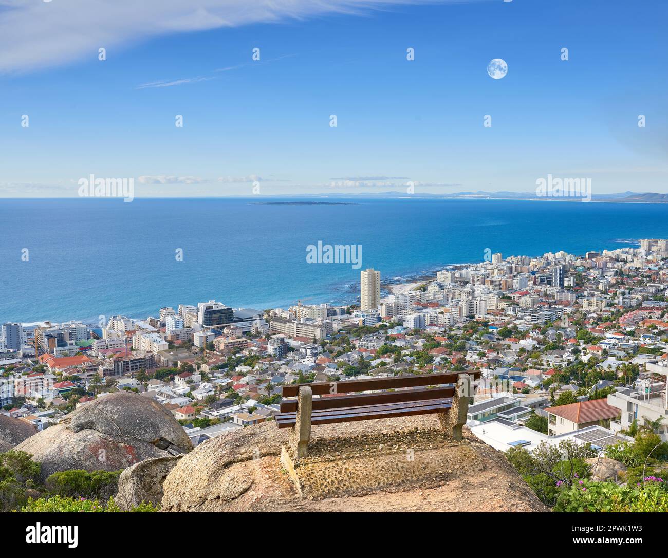 Scenic landscape banner view of a public bench on a cliff or hill ...