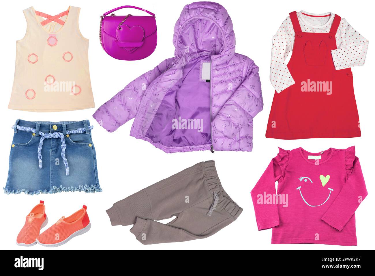 Collage set of little girl autumn clothing isolated on white. The ...
