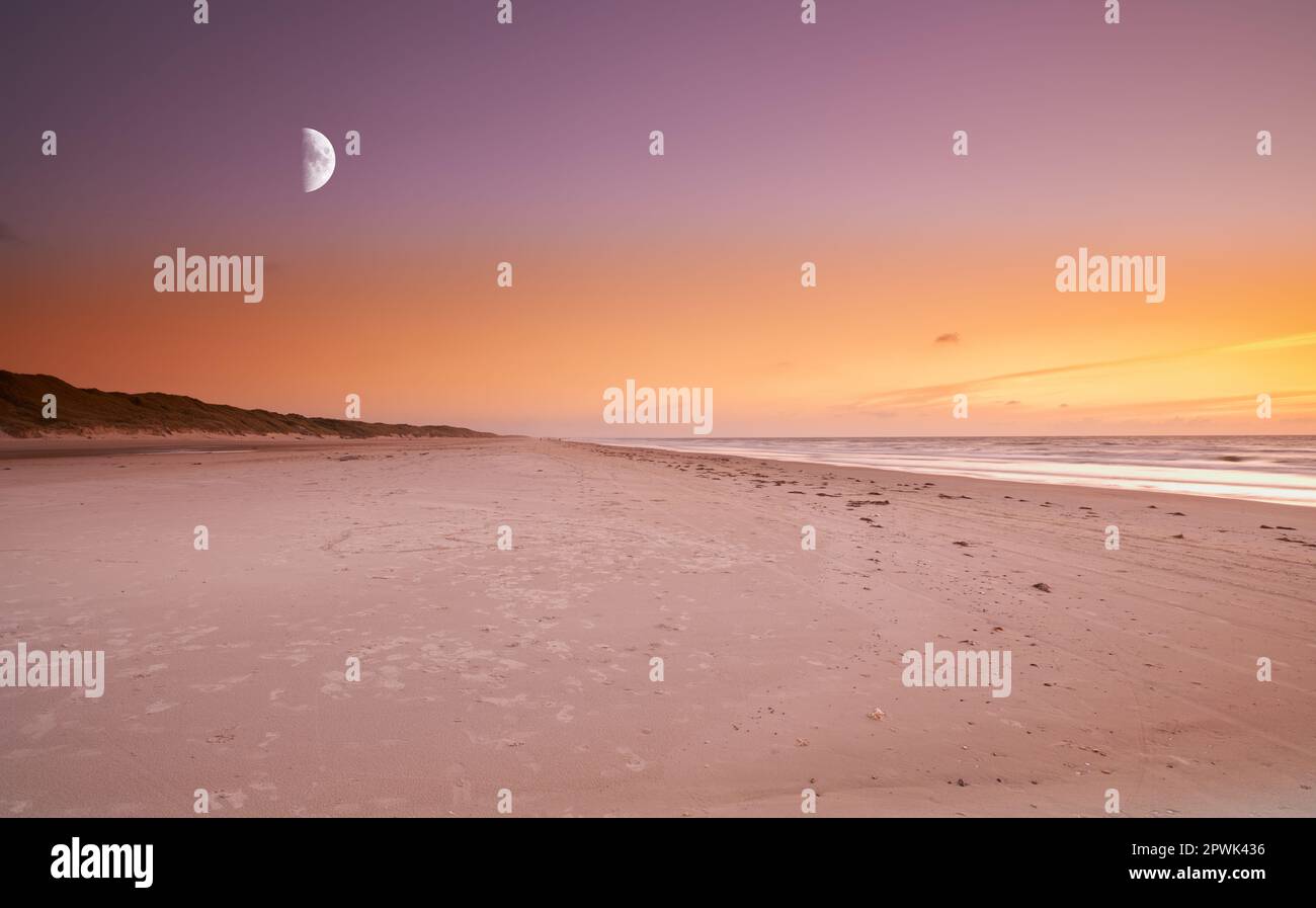 Copy space at sea with moon in the twilight night sky and calm ocean ...