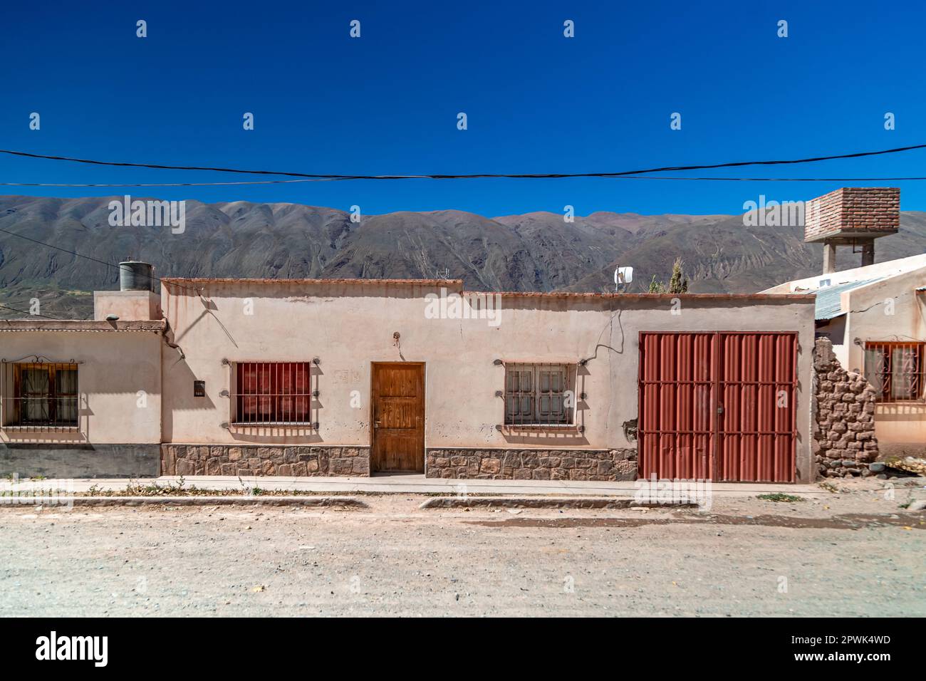 a house made of clay and red bricks in the countryside of Aregenina in ...