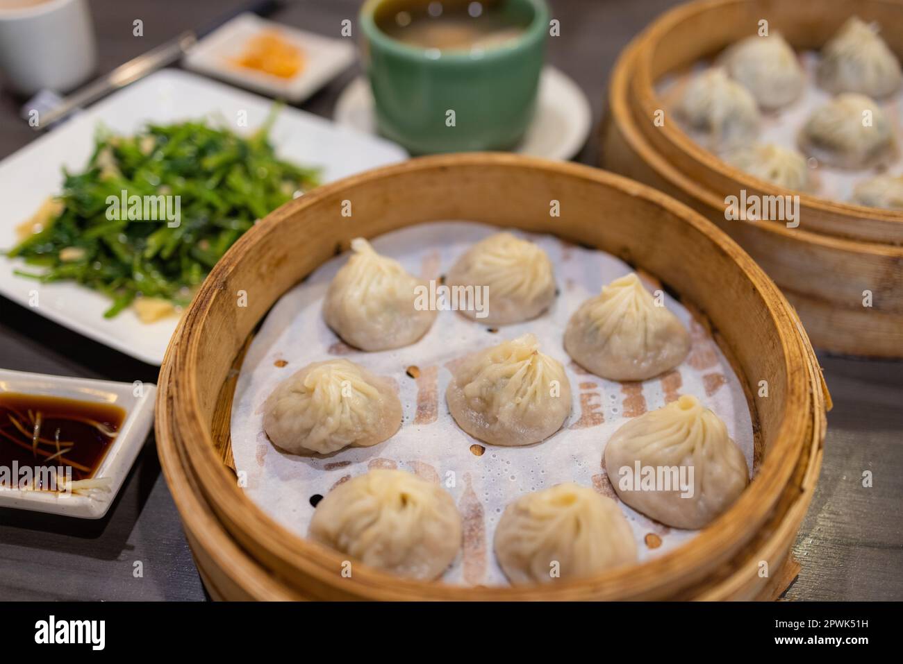 Chinese style steamed soup bun in restaurant Stock Photo - Alamy