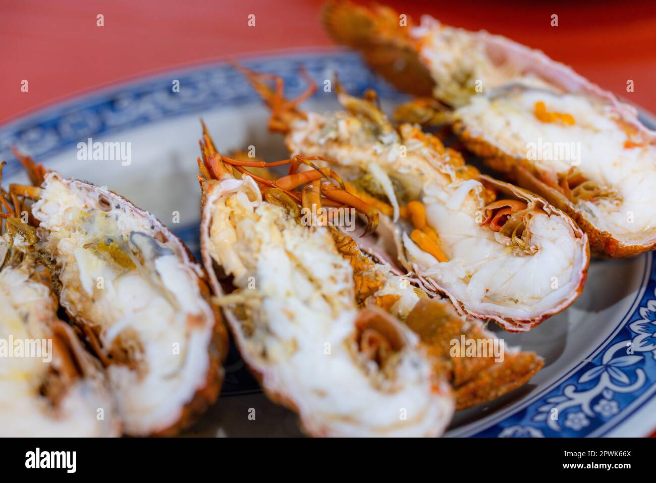 Steamed lobster in vegetable decoration Stock Photo - Alamy