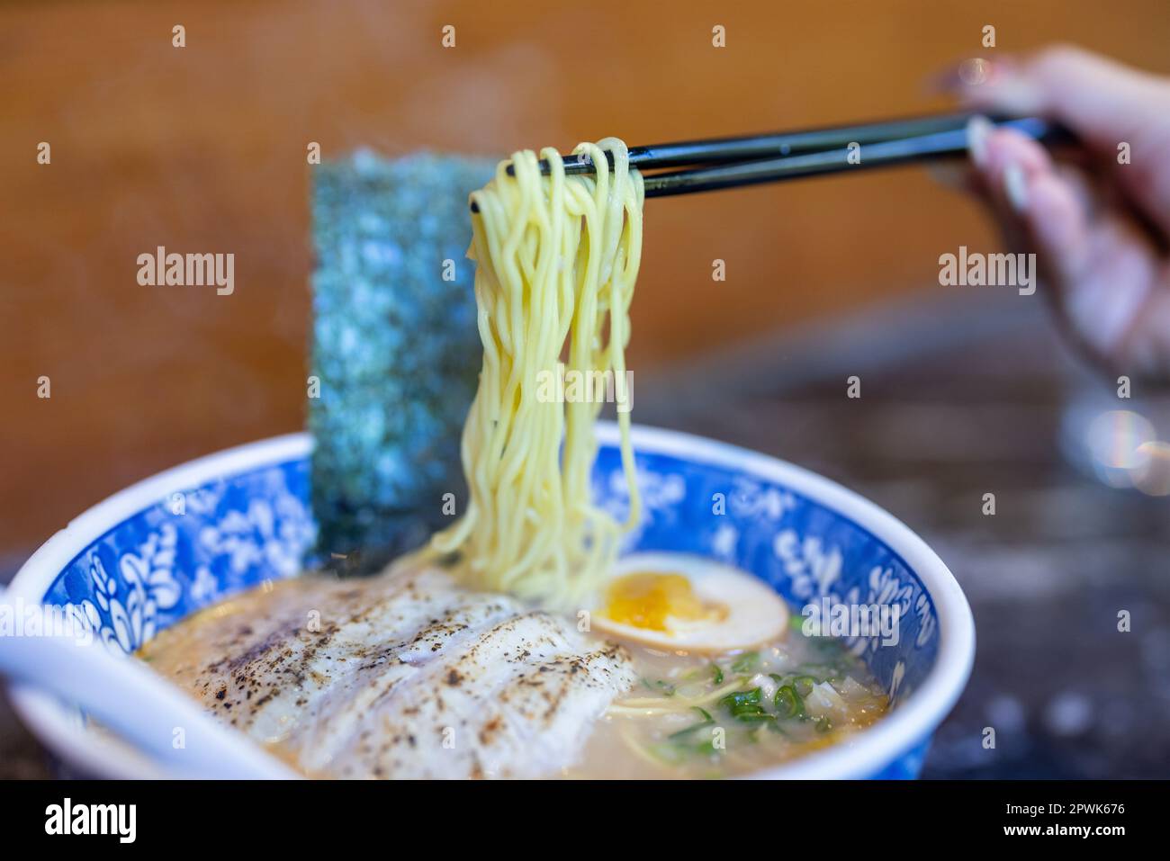 Grilled fish soup Japanese ramen bowl Stock Photo - Alamy