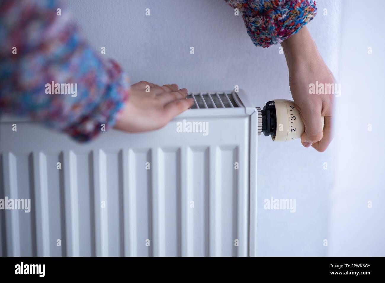 Cold, depressed mid-aged woman at home feeling sad, lonely, anxious ...