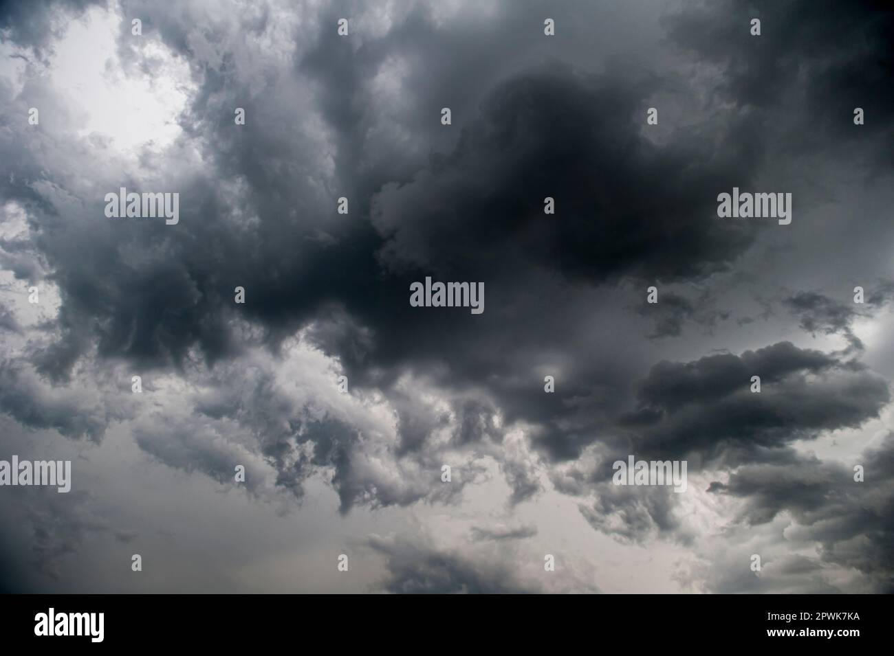 Dramatic grey thunderstorm sky with wisps of clouds Stock Photo - Alamy