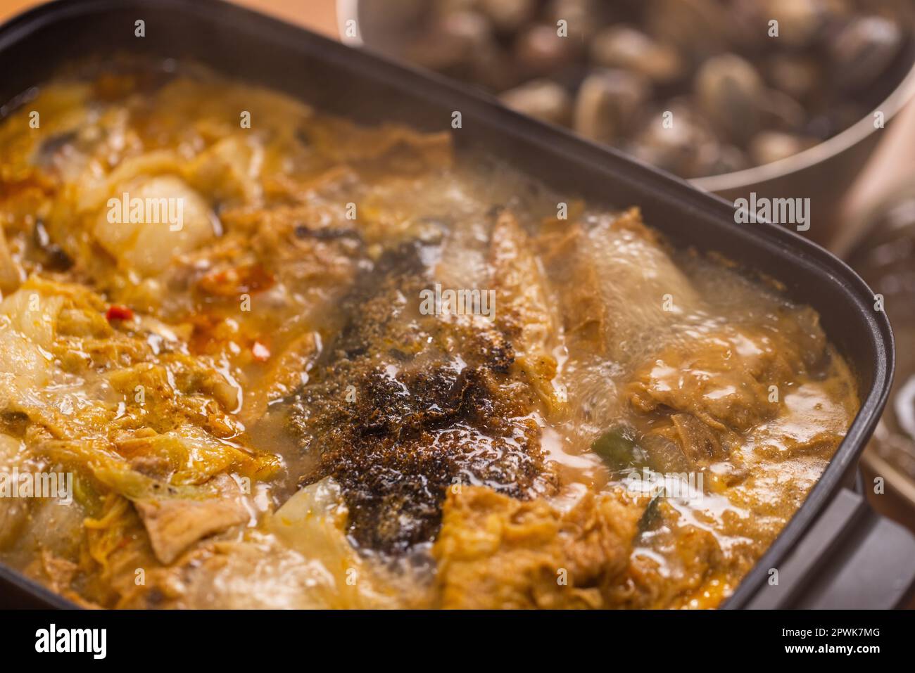 Homemade fish head soup hot pot Stock Photo - Alamy