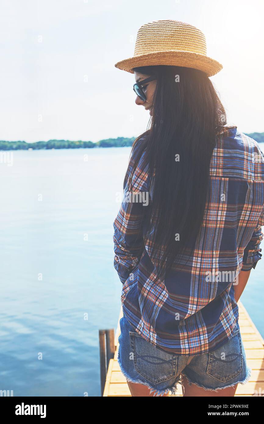 Shes Happiest At The Beach An Attractive Young Woman Enjoying A Day On