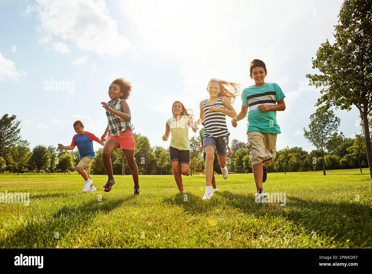 Making it a day of complete fun. a group of diverse and happy kids ...