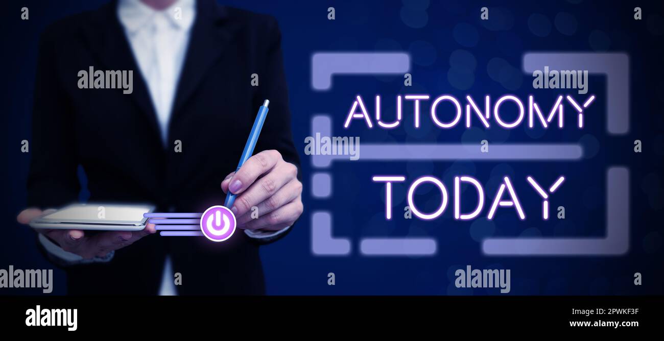 Hand writing sign Autonomy, Business idea vehicle that can guide itself without human conduction ...