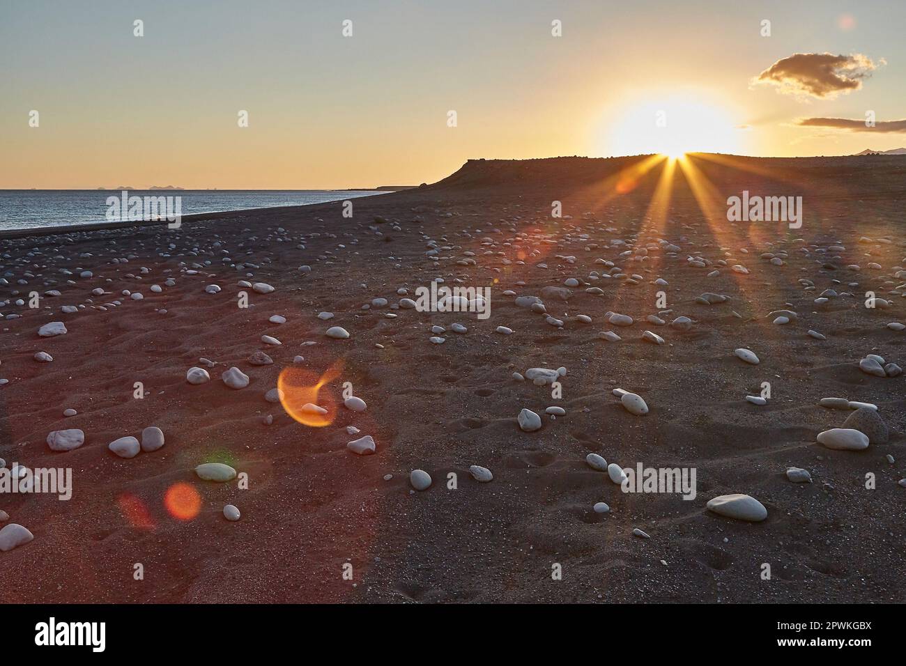 Iceland black sand landscape with stones lying on the ground and ...