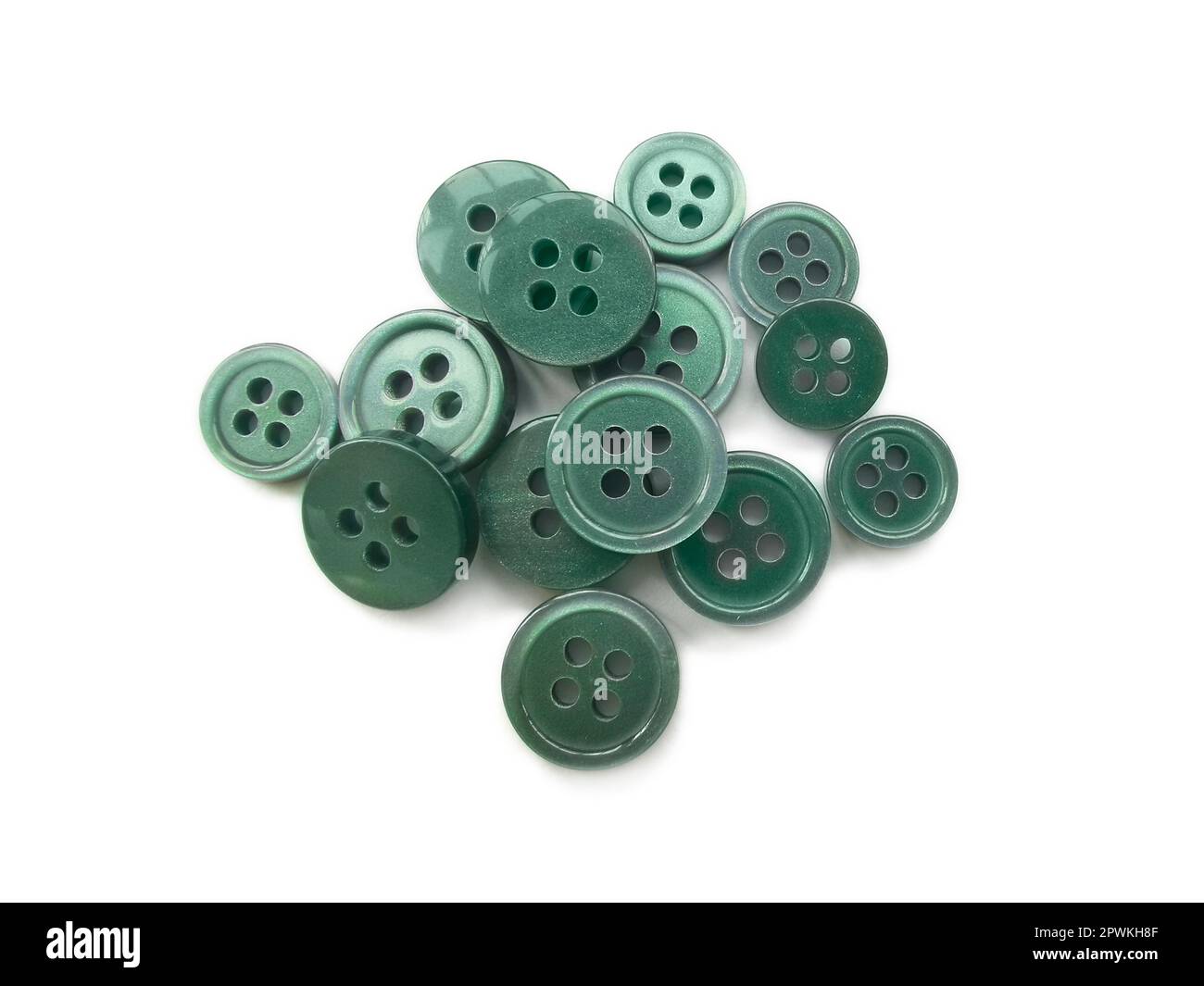 clothing buttons on white background Stock Photo - Alamy