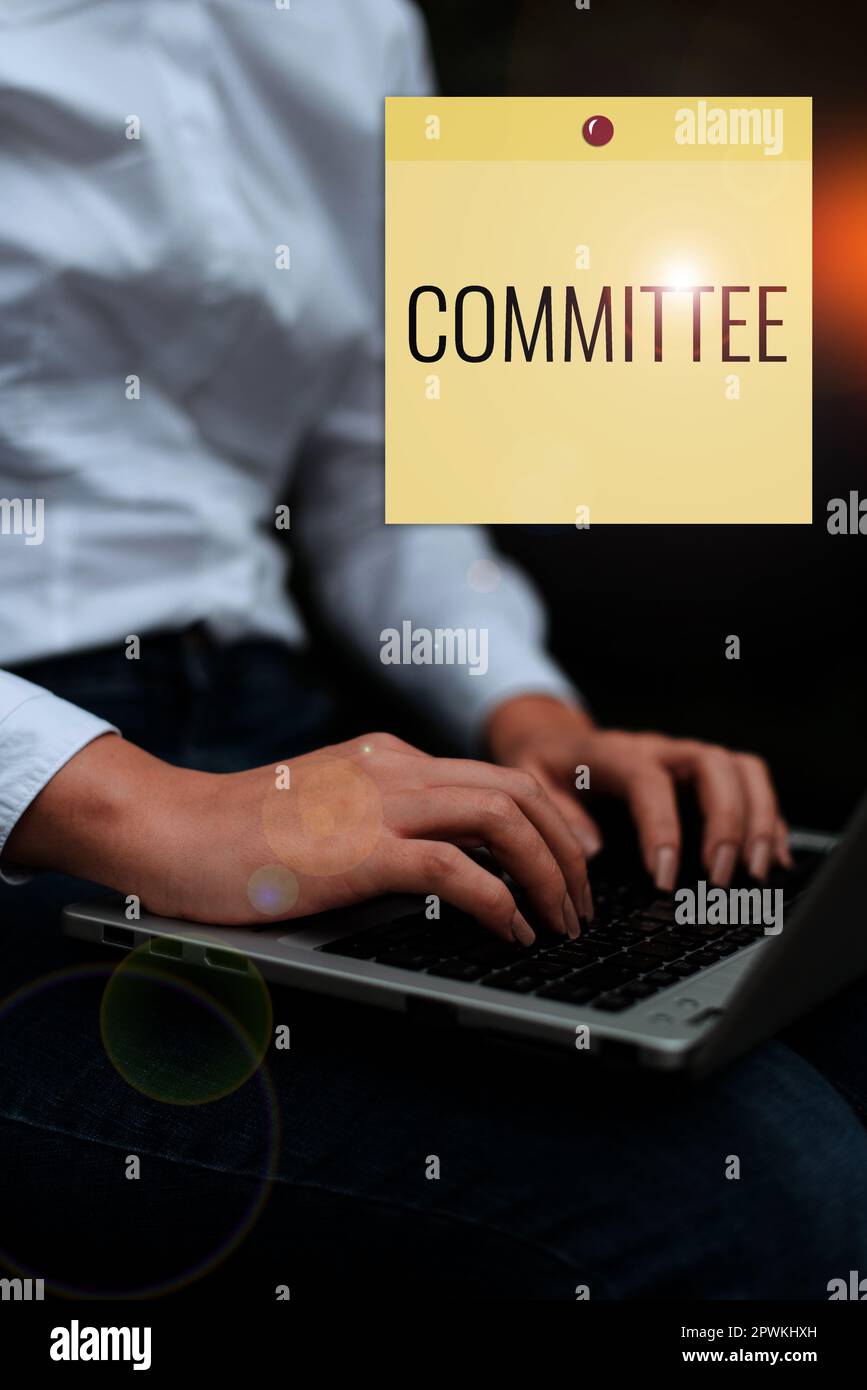 Sign displaying Committee, Word Written on Group of people appointed ...