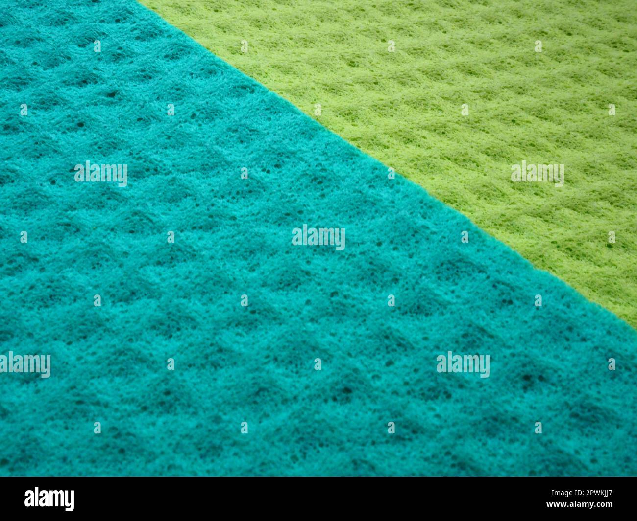 Sponge fibers sponge texture pattern surface close-up green yellow ...