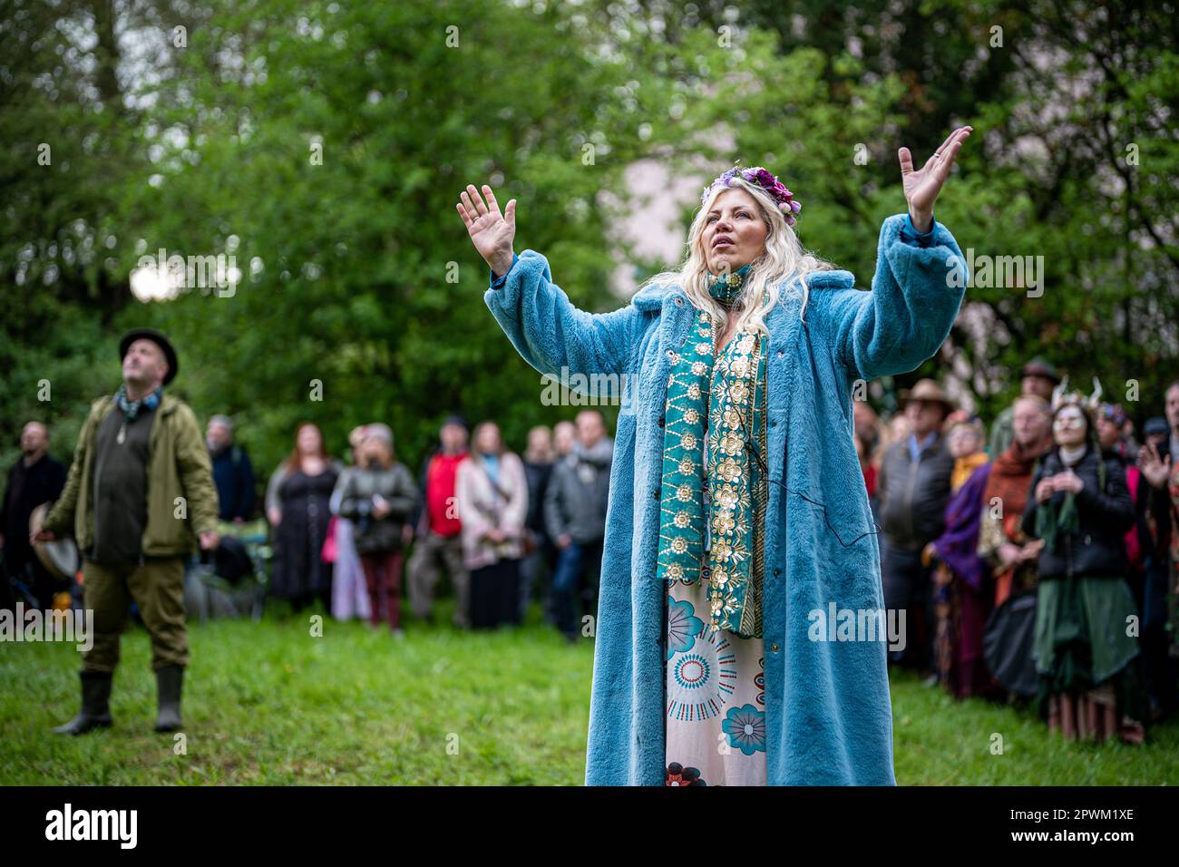 People take part in the Beltane ceremony at Chalice Well, Glastonbury ...