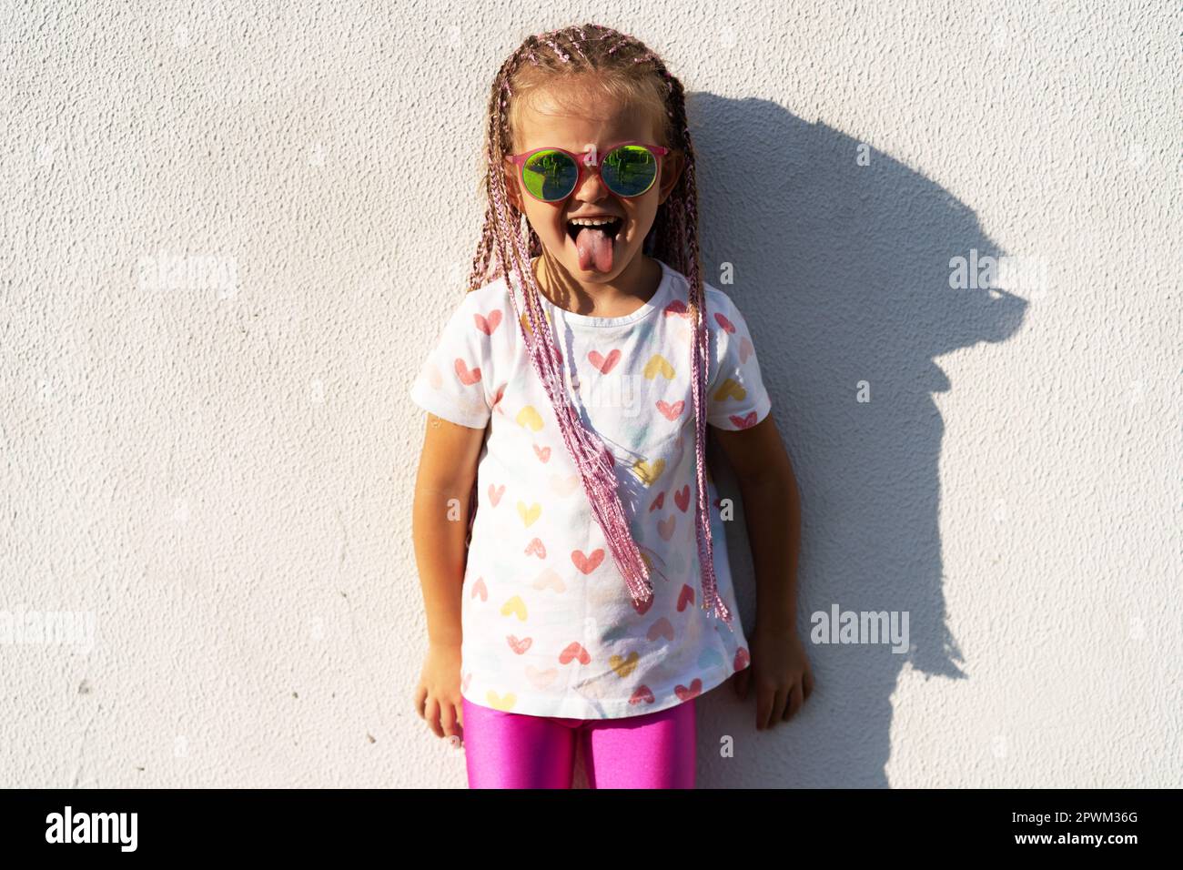 little girl in bright clothes Stock Photo - Alamy