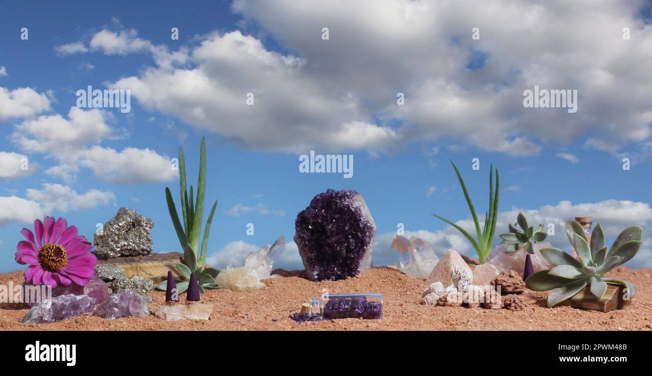 Chakra Stones and Flowers on Australian Red Sand Meditation Altar Stock ...