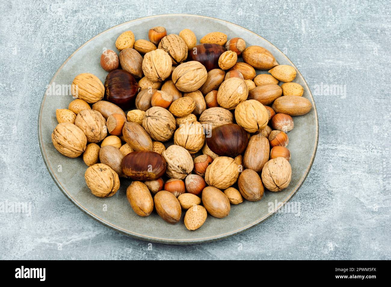 Walnut, chestnut, almond, hazelnut on the table.Healthy food and snacks ...