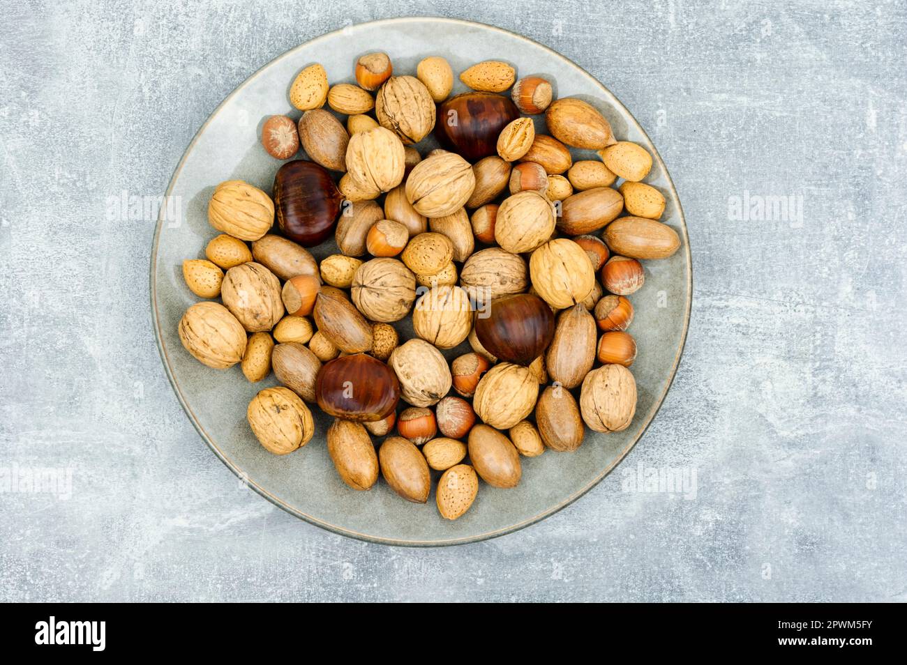 Walnut, chestnut, almond, hazelnut on the table.Healthy food and snacks ...