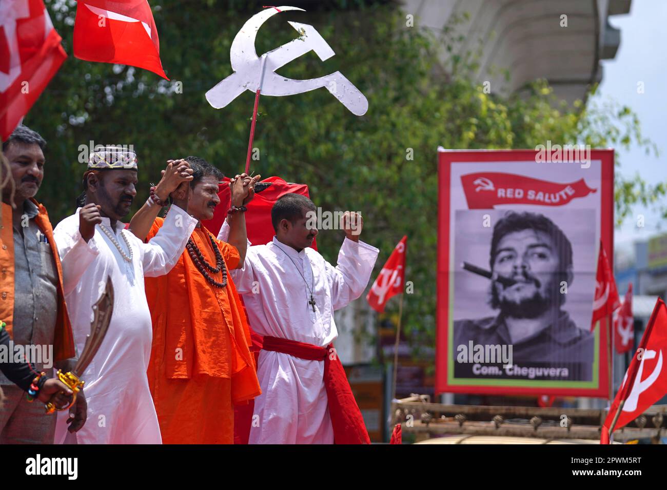 Members of Centre of India Trade Unions (CITU) dressed as Muslim, Hindu ...