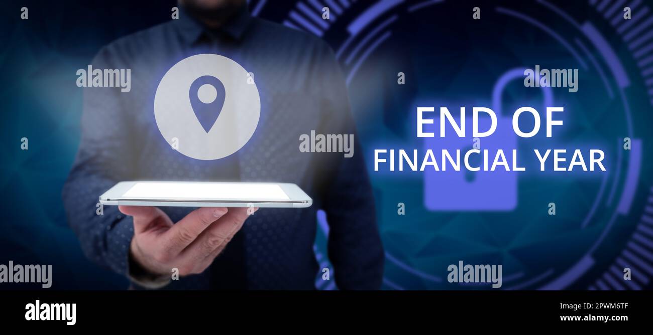 Hand writing sign End Of Financial Year, Concept meaning Revise and ...