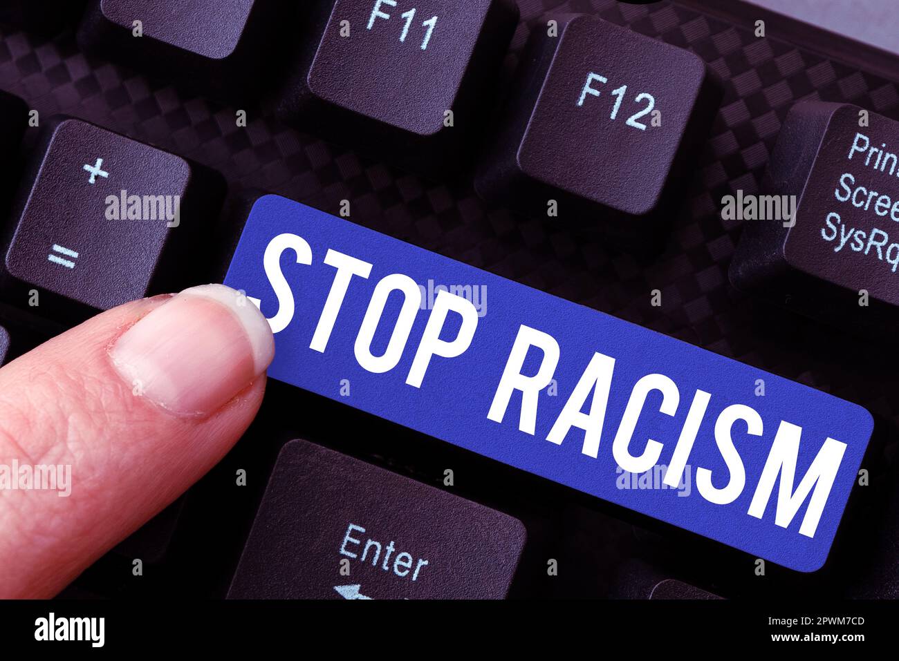 Text sign showing Stop Racism, Word Written on end the antagonism ...