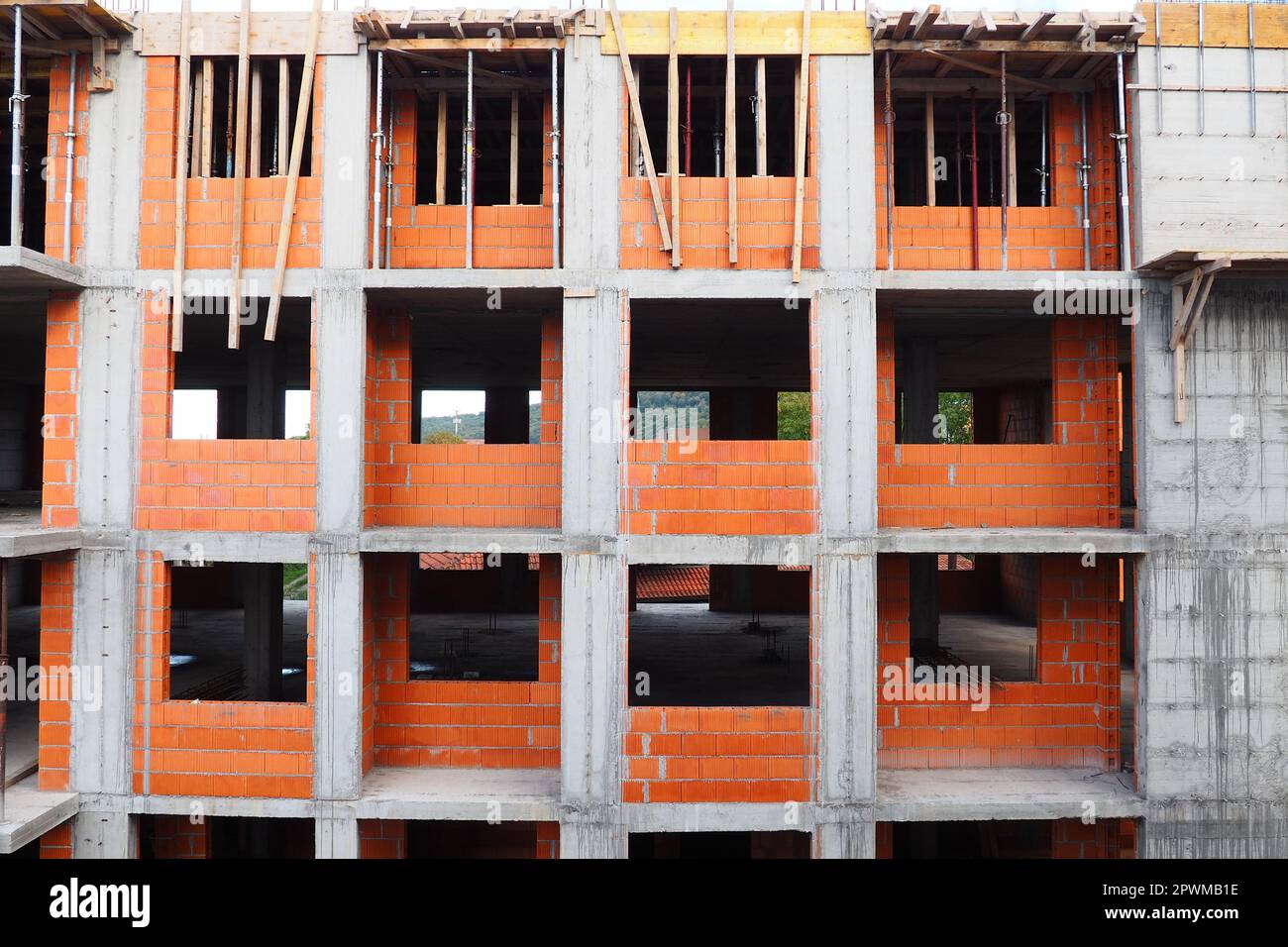 Red ceramic bricks at the construction site. Keramoblock. Hollow brick ...
