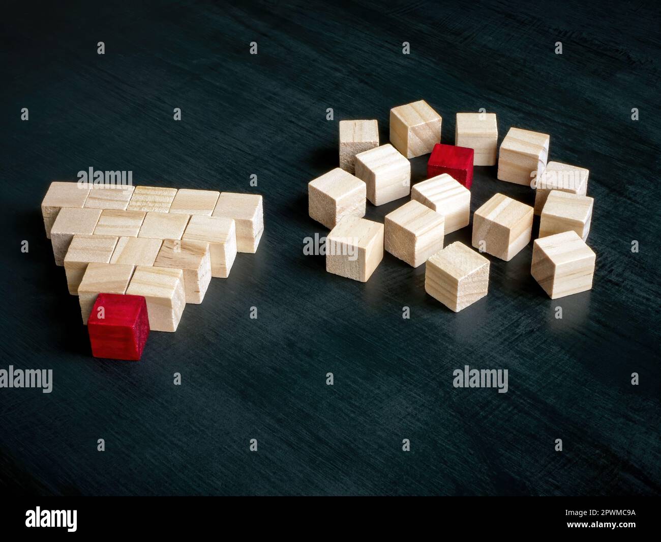 Pyramid of cubes and a pile. Concept leadership leader or boss Stock ...