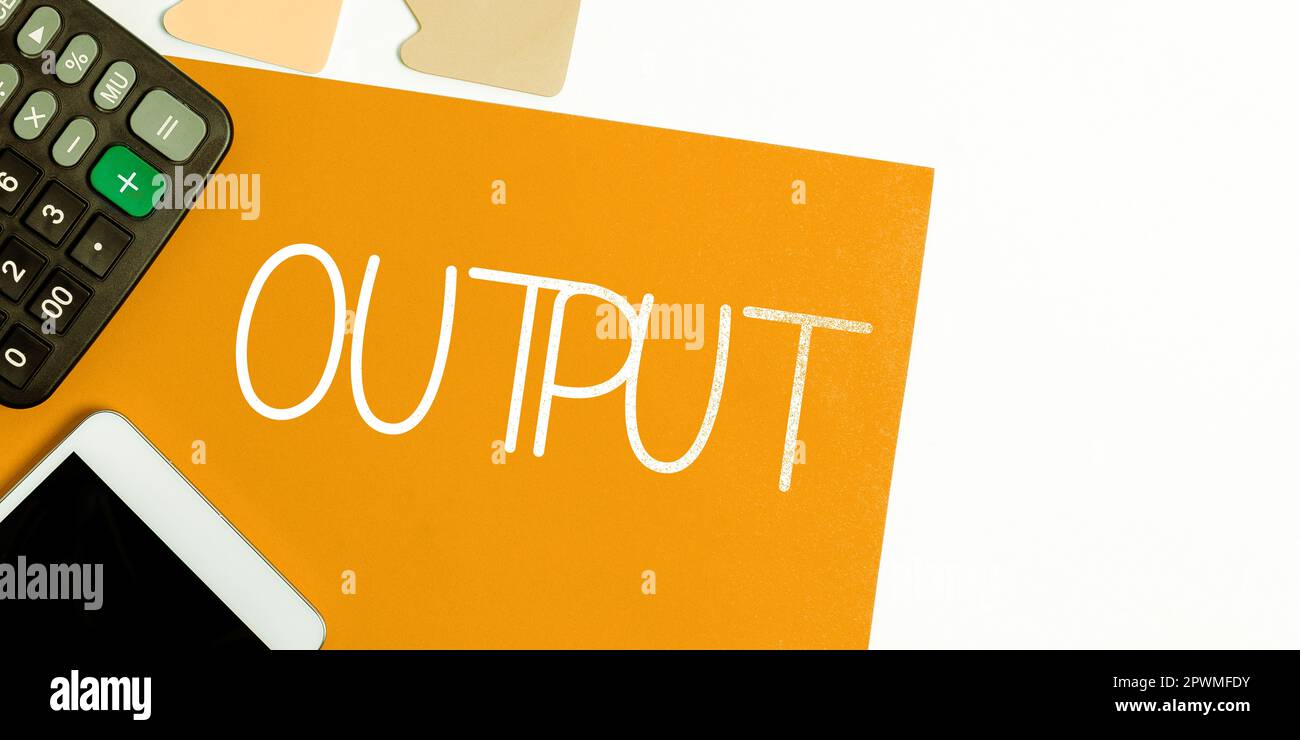 Hand writing sign Output, Business concept the final result of ...