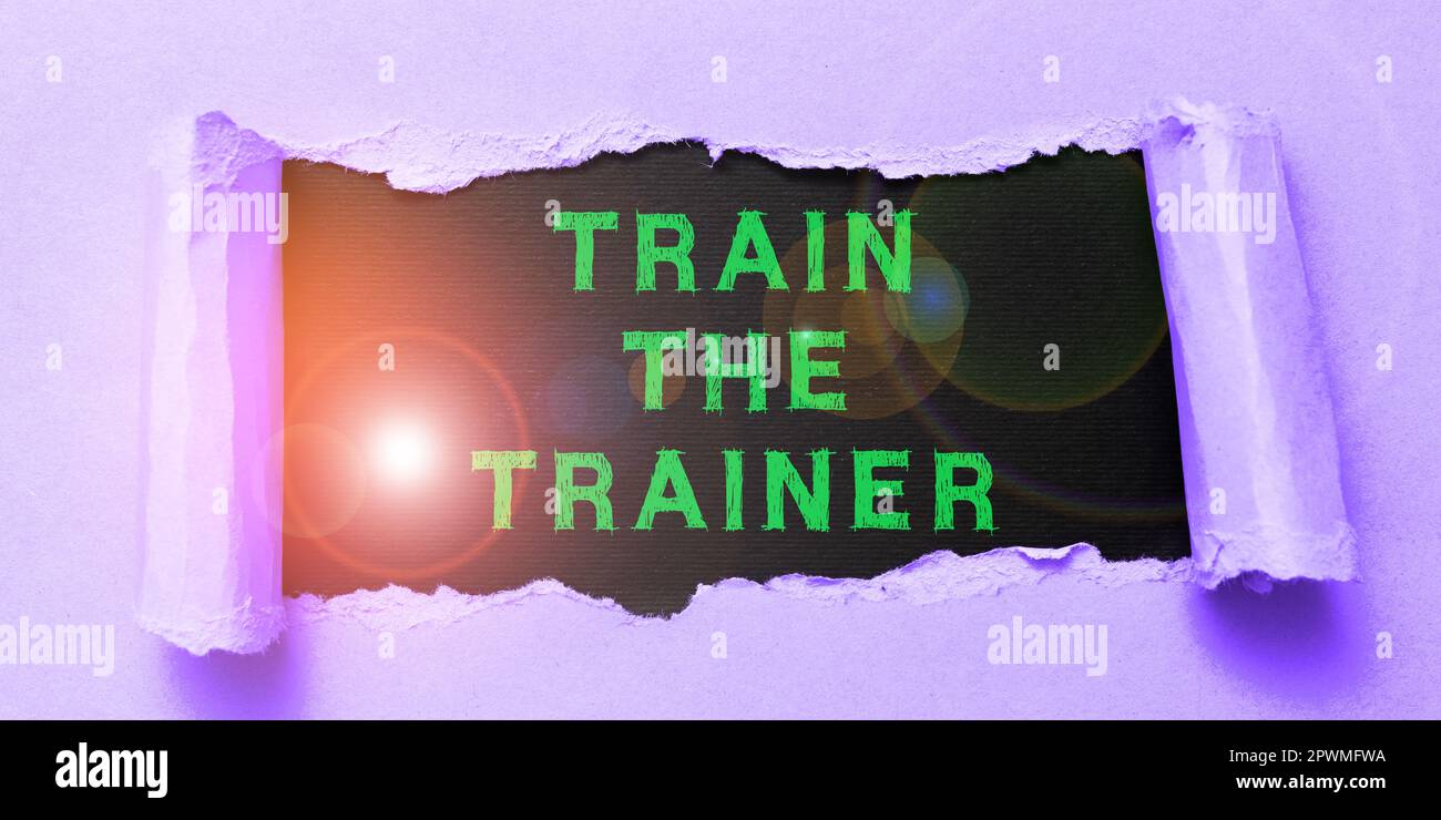 Sign displaying Train The Trainer, Word Written on identified to teach ...