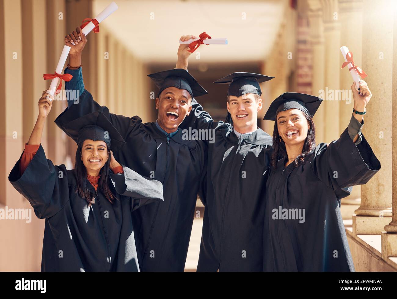 Students, hands up or graduation success with diploma paper ...