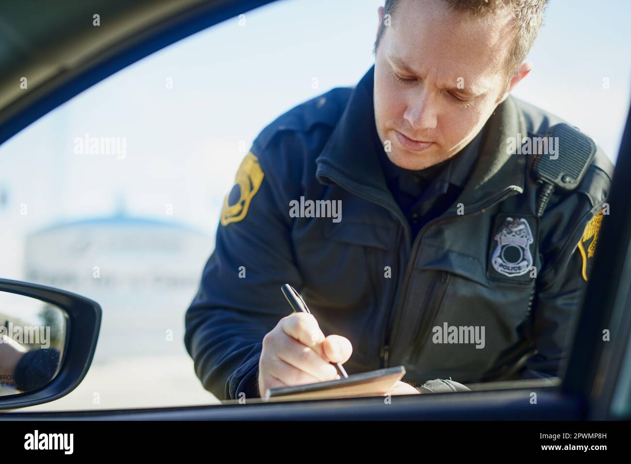 Police issuing ticket driver hi-res stock photography and images - Alamy