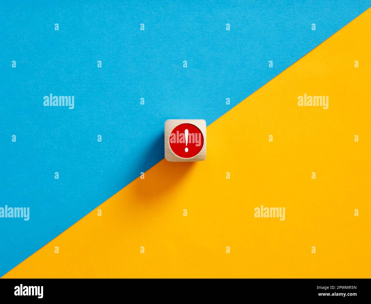 Exclamation Mark Warning Sign On A Wooden Cube Push Button