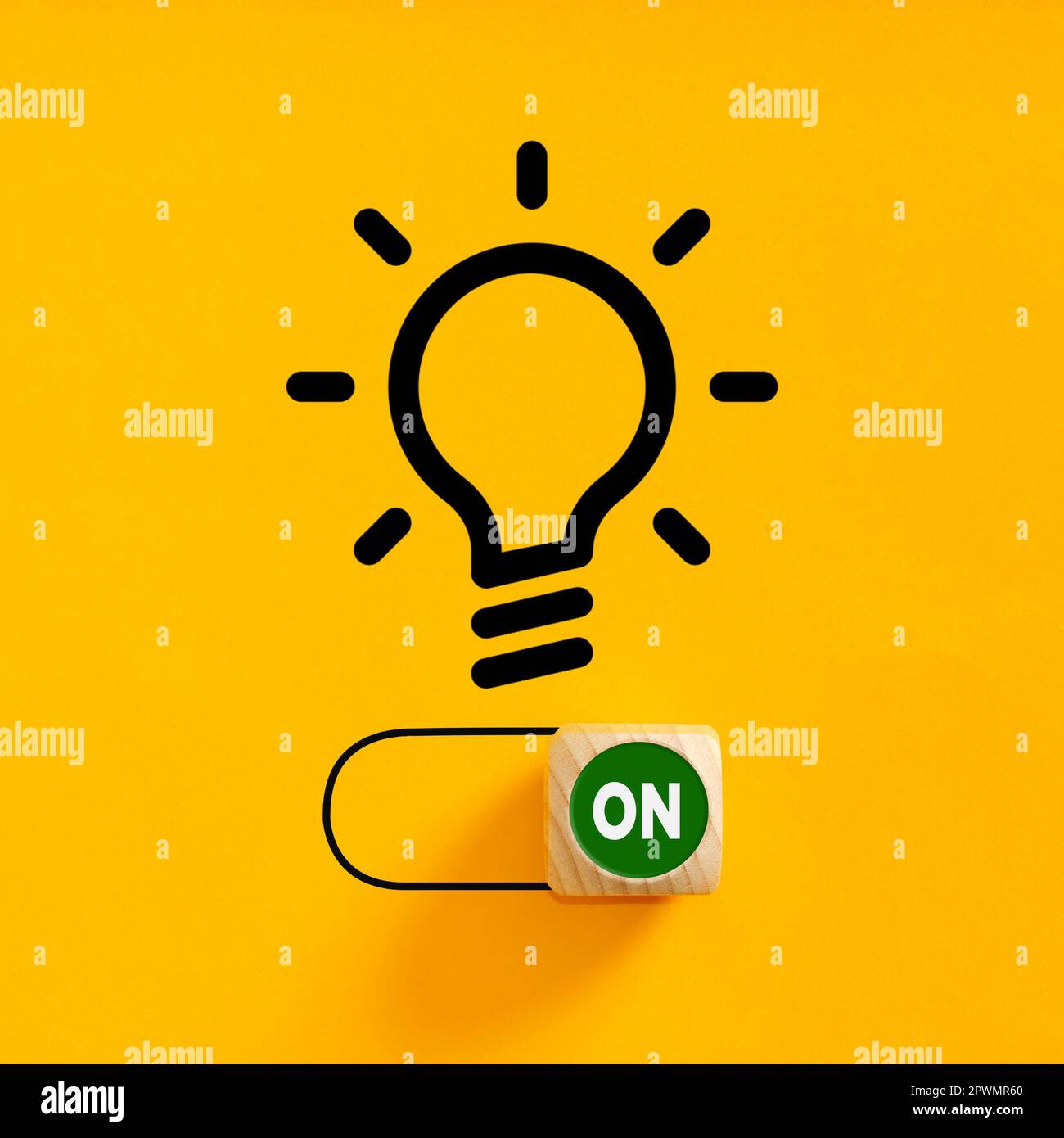 Power on slider button under a light bulb idea symbol on yellow ...