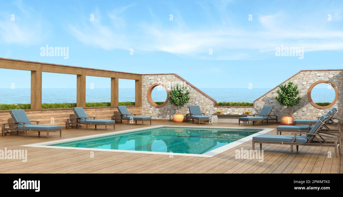 Outdoor summer swimming pool near the sea with sunbeds and stone wall ...