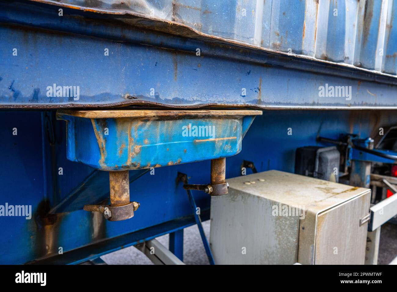 Container locking pin on a blue trailer Stock Photo - Alamy