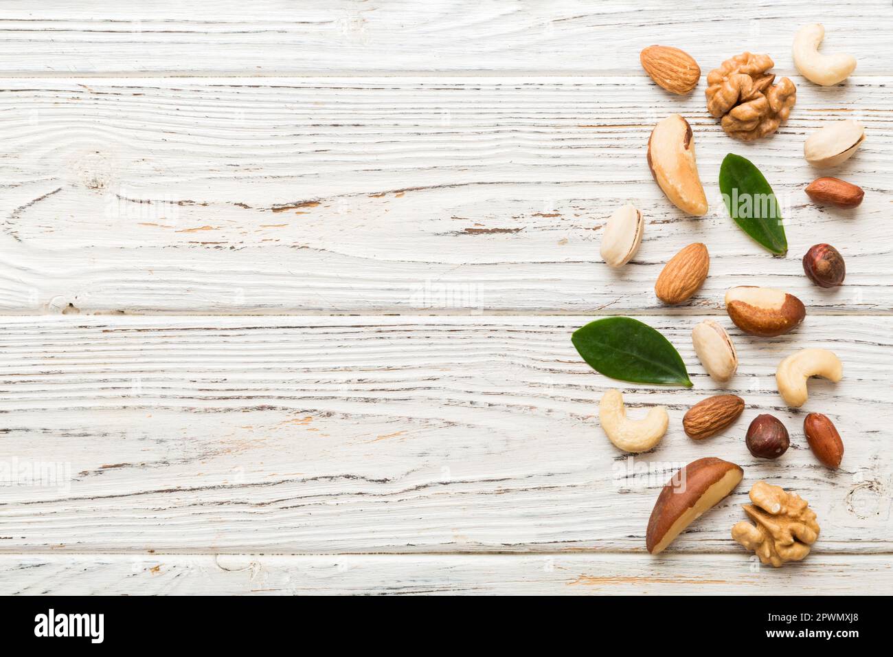 Composition of nuts , flat lay - mix hazelnuts, cashews, almonds on ...