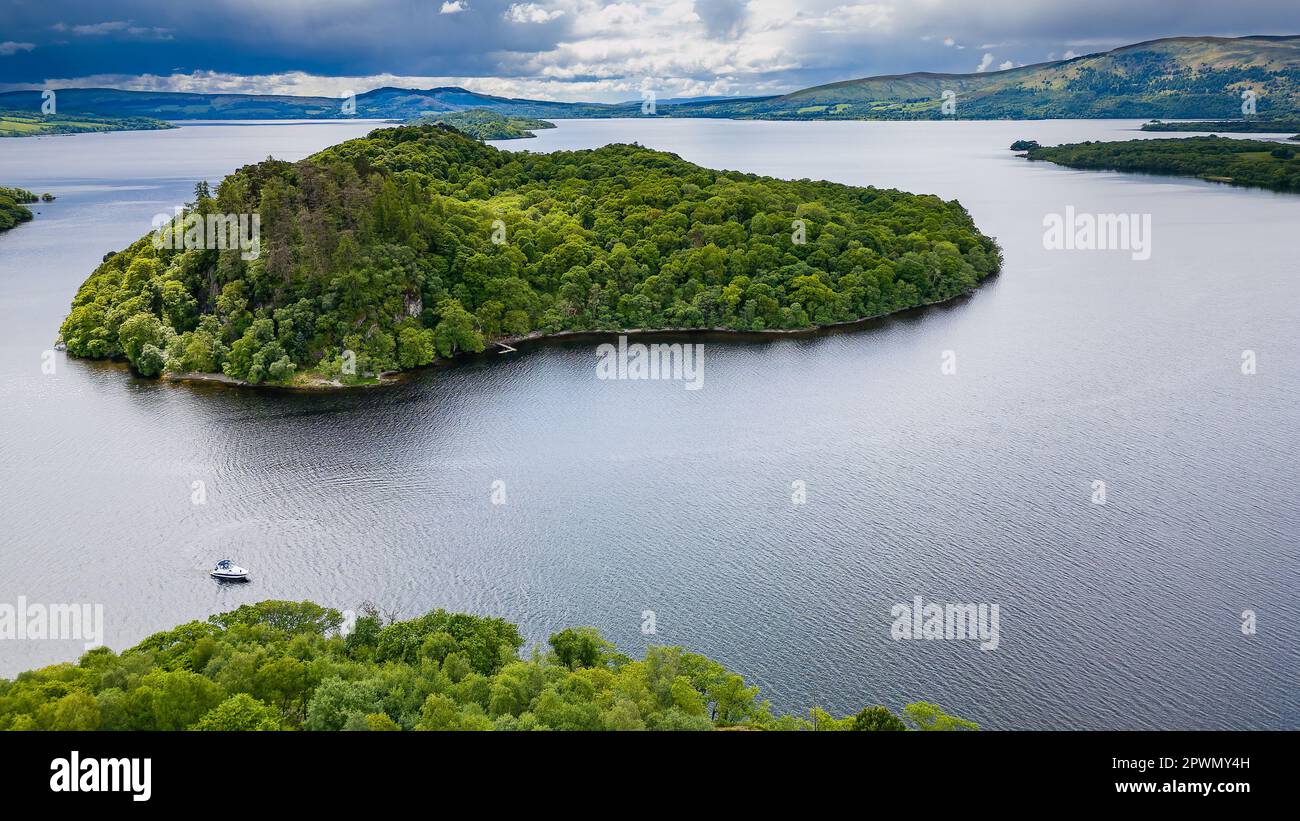 Aerial view of Inchcailloch island on Loch Lomond, Scottish Highlands ...