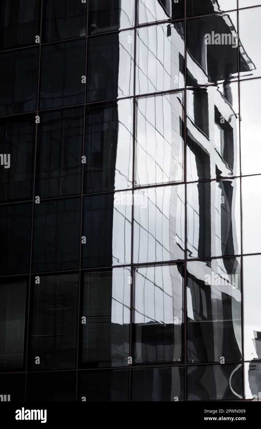 Windows in high-rise office building. Facade of a modern business ...