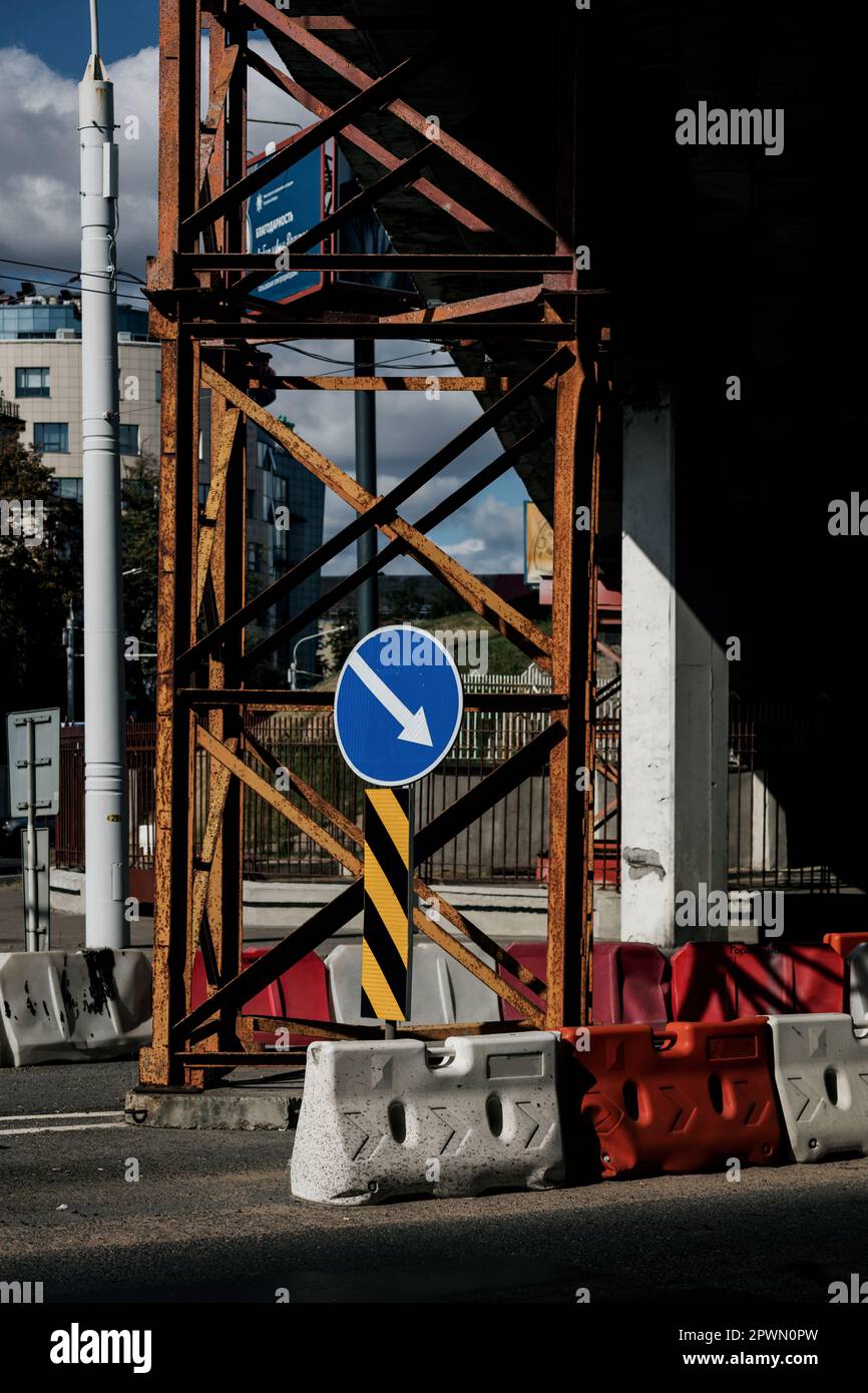 reconstruction of the road as evidenced by a white arrow on a blue ...