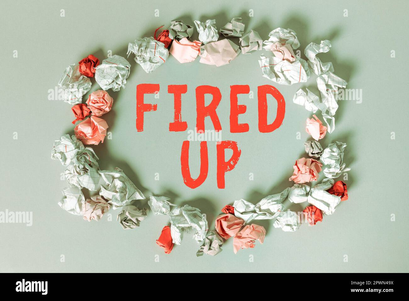 Sign displaying Fired Up, Word Written on means that someone energized ...