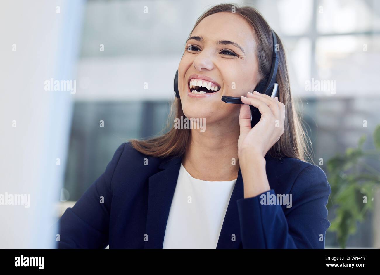 Call center, telemarketing and laughing woman on a customer service ...