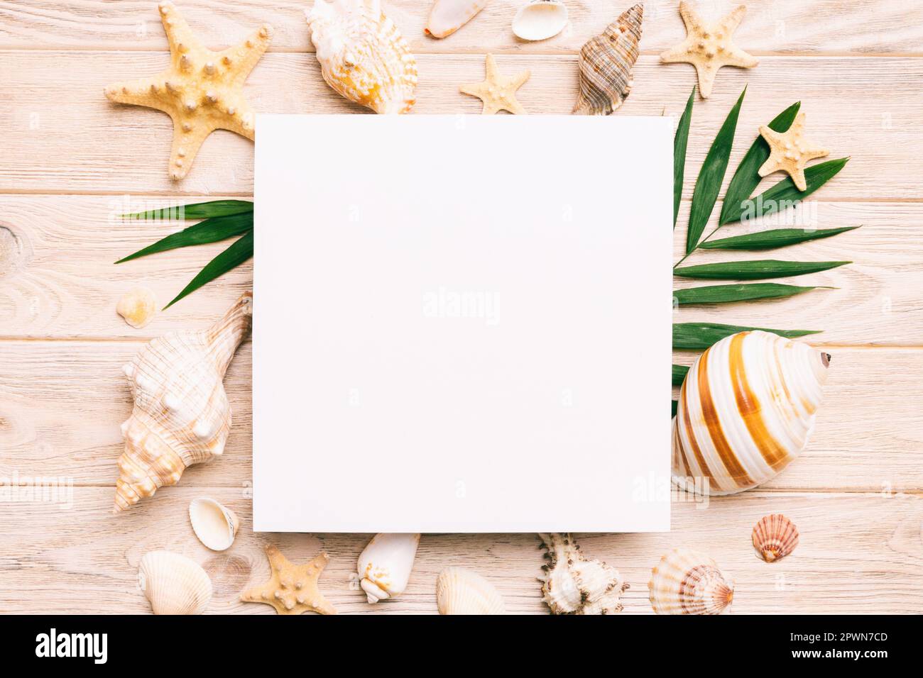 Summer time concept with blank greeting card and blank white paper on ...