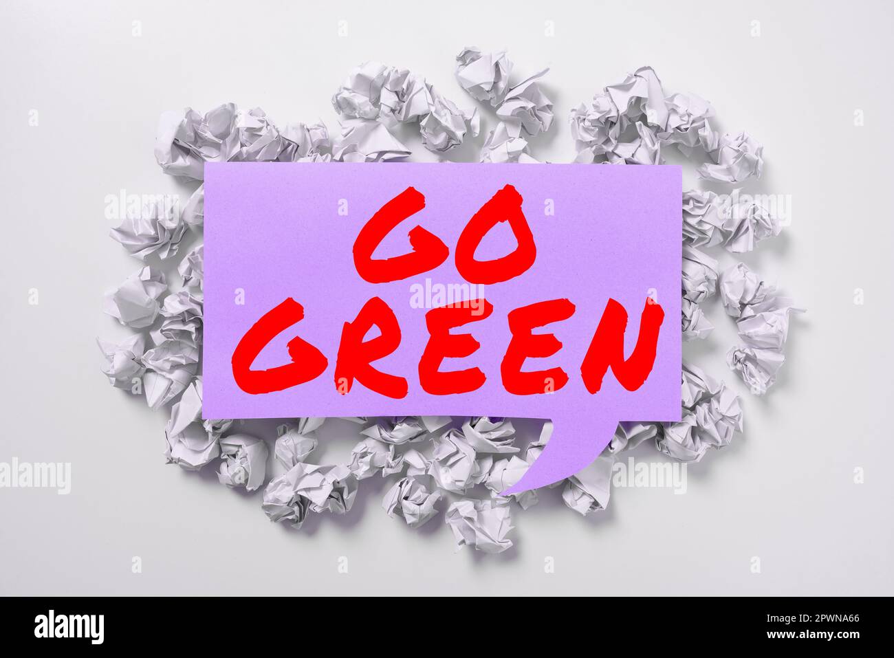 Sign displaying Go Green, Business showcase making more environmentally ...
