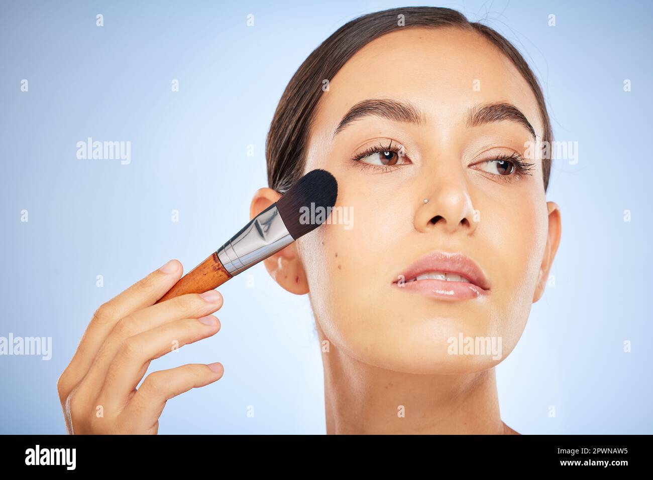 Beauty, brush or woman in a makeup skincare daily routine for a beautiful glowing smooth face in ...