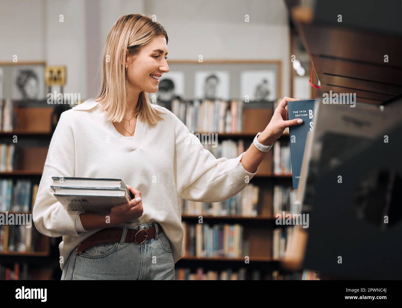 Girl packing books hi-res stock photography and images - Alamy