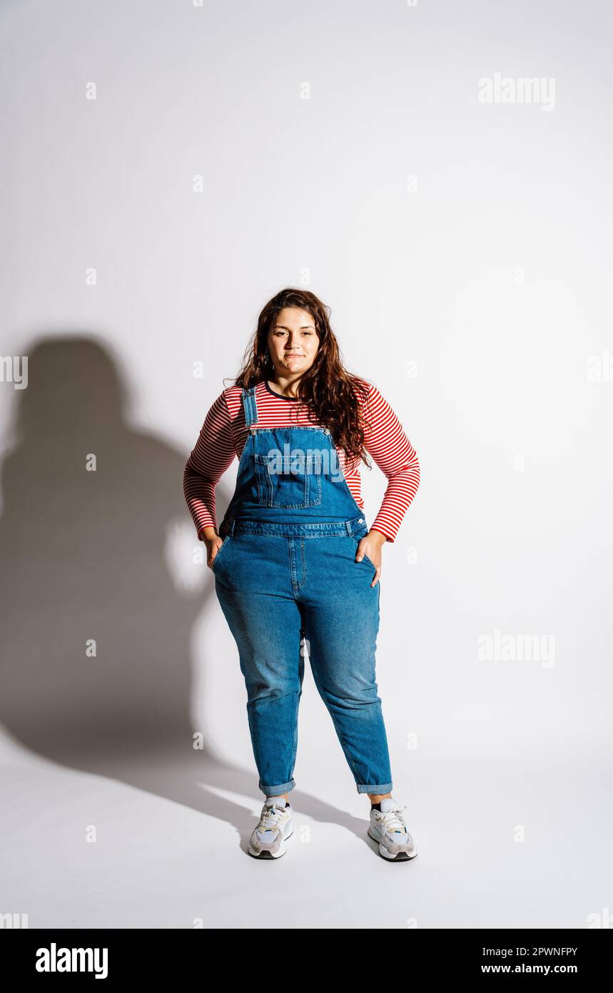 Plus size woman model posing in studio and having fun. Shots taken on ...
