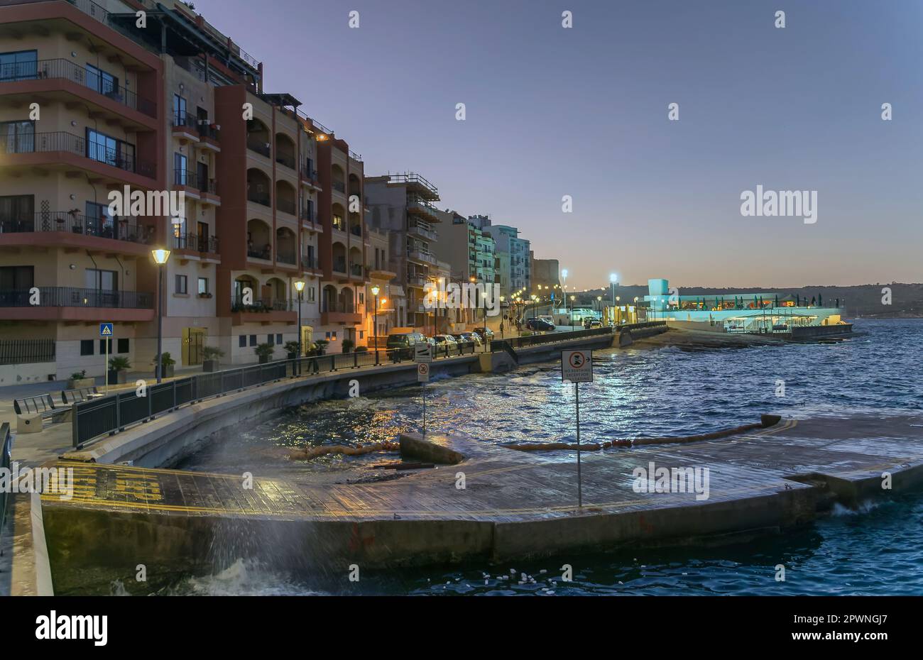 Malta, St Paul’s Bay: Panoramic night view of St Paul’s Bay, a popular ...