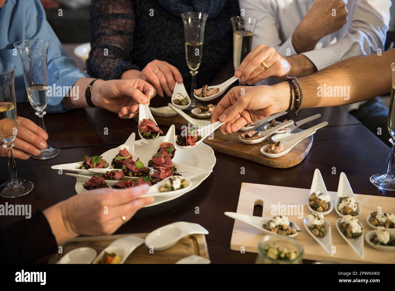 Women party buffet hi-res stock photography and images - Alamy