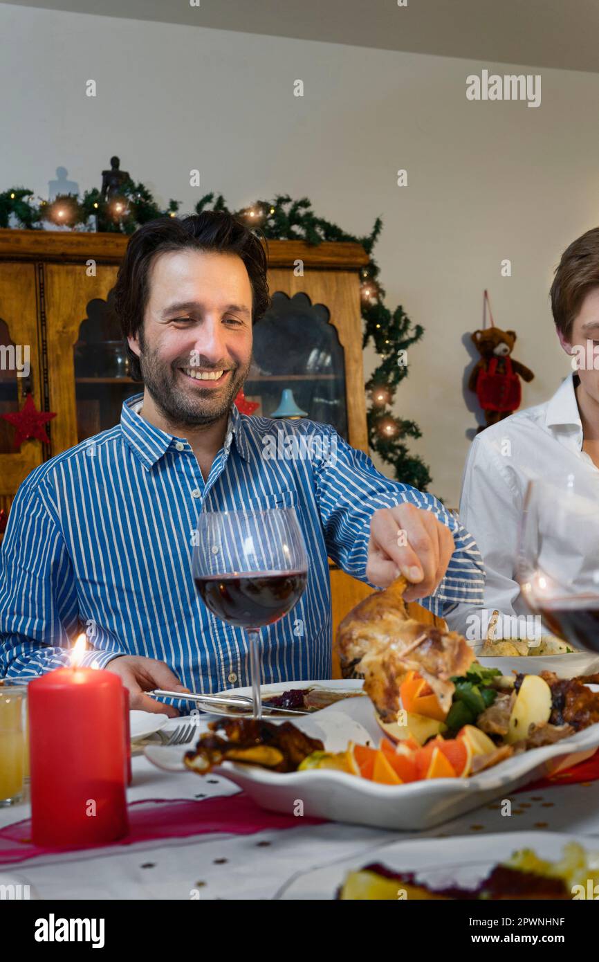 Father and son having dinner hi-res stock photography and images - Alamy